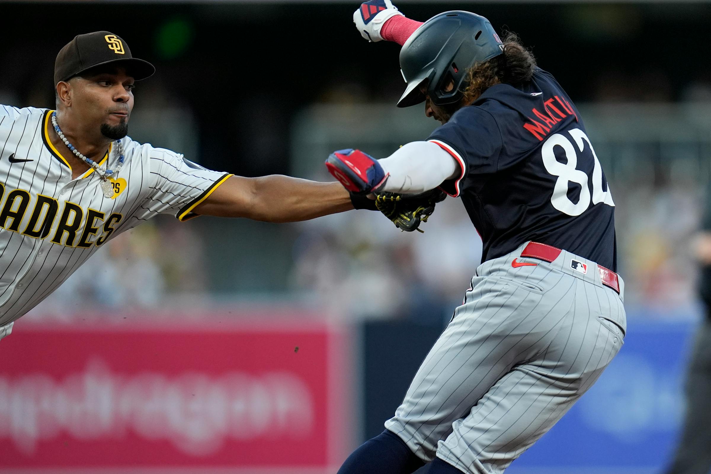 Twins fall to Padres 5-3 as first two MLB walks come back to haunt ...