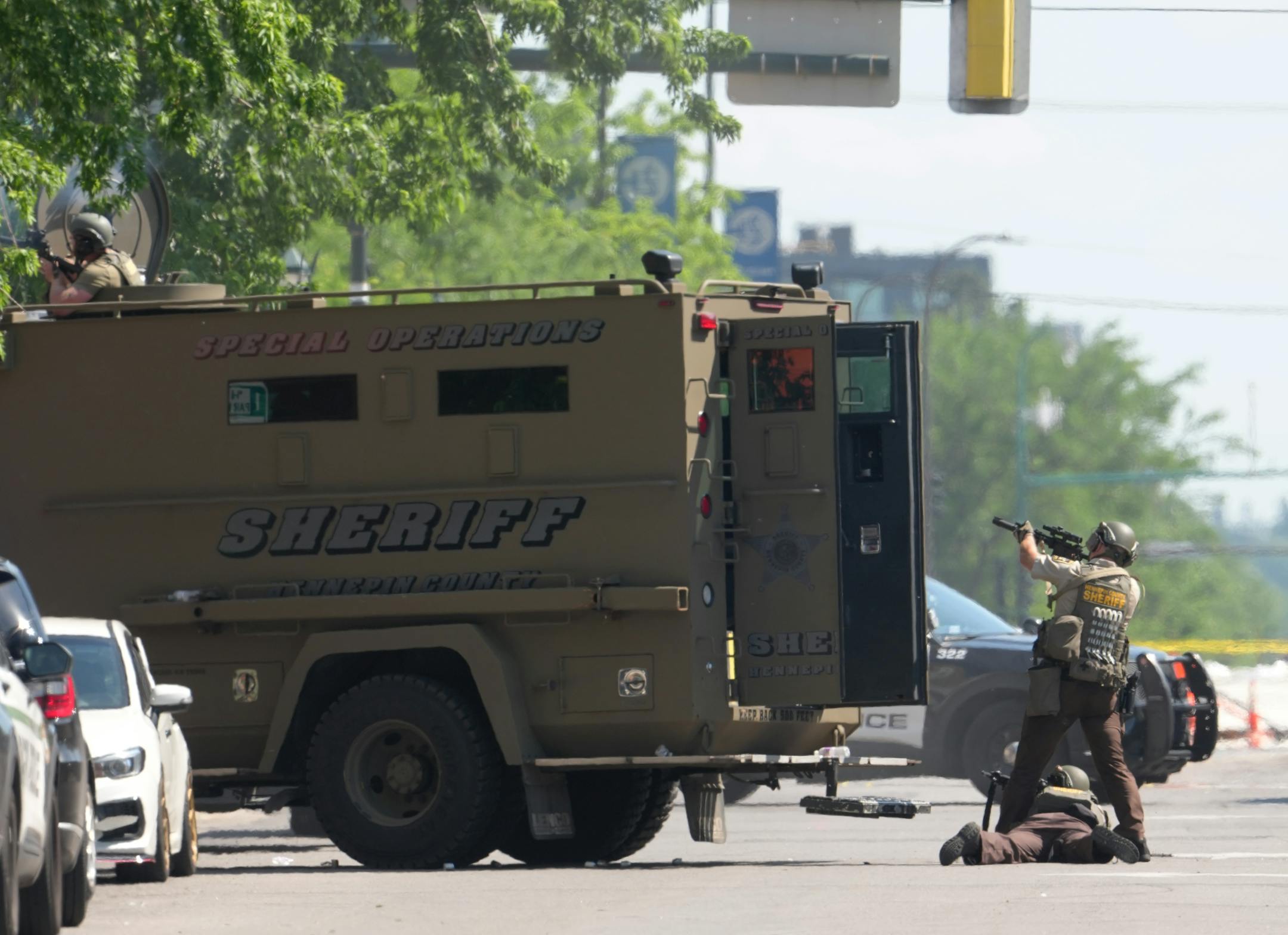 Charges: Gunman took aim at 18 officers during Nicollet Av. standoff