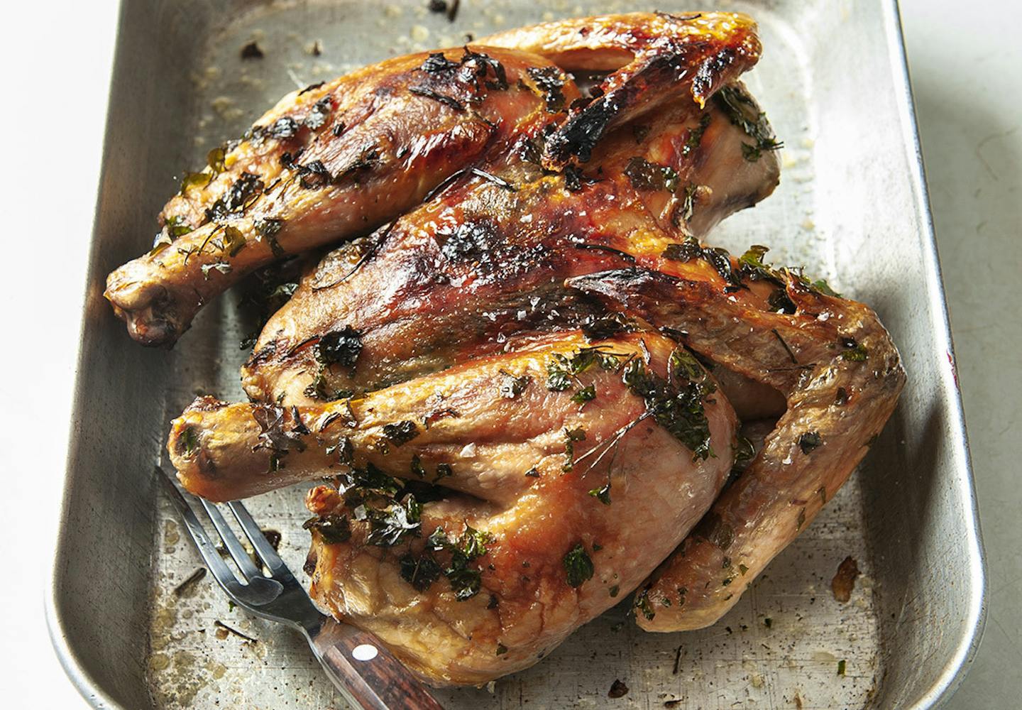 The key to a perfect roast chicken is the spatchcock method