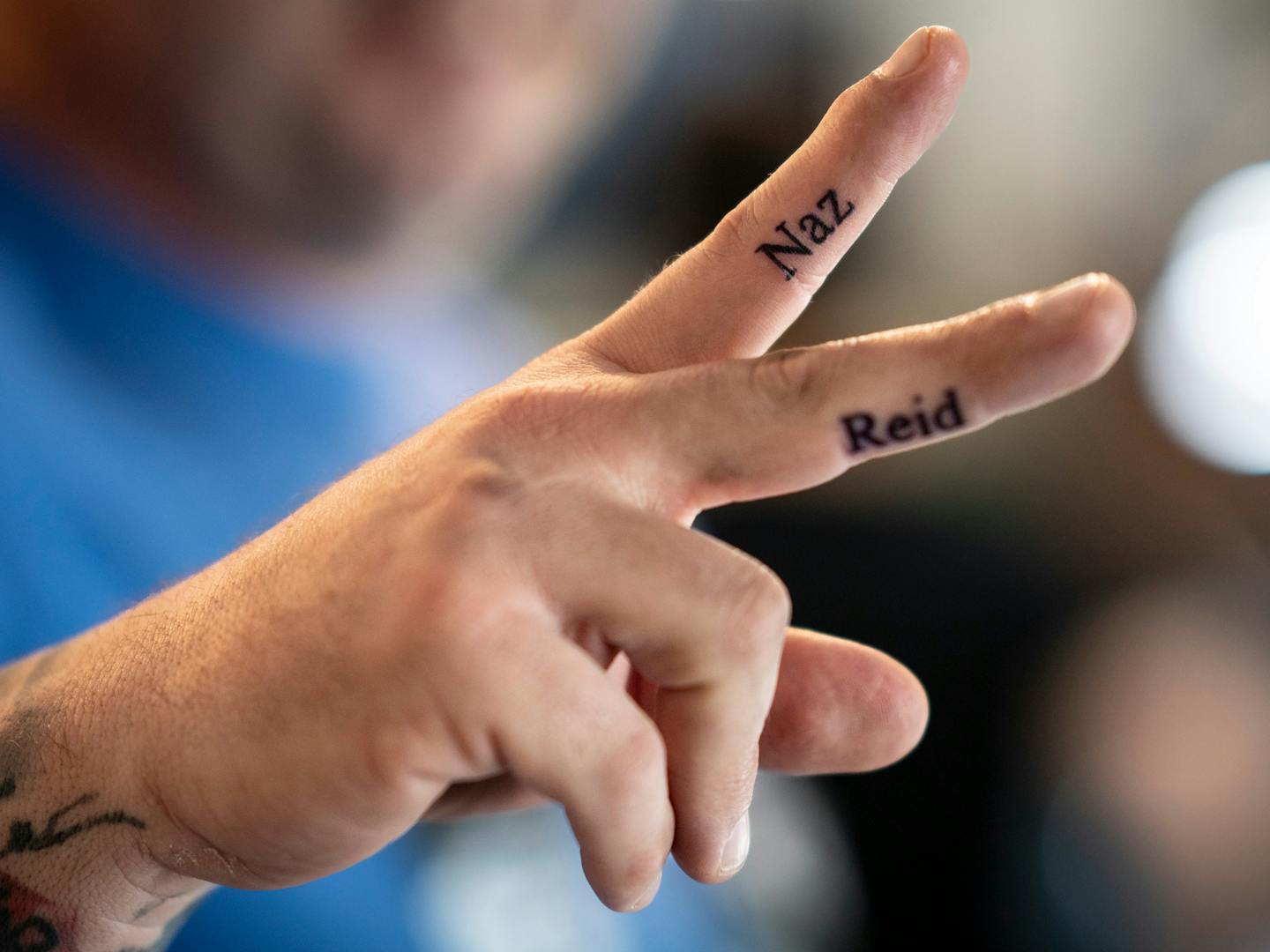 Tattoo artist inks 'Naz Reid' on dozens of Timberwolves fans ahead of ...