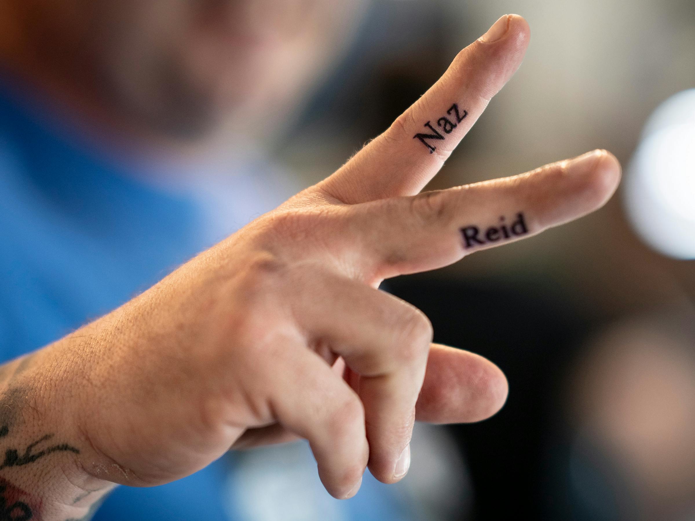 Tattoo artist inks ‘Naz Reid’ on dozens of Timberwolves fans ahead of ...