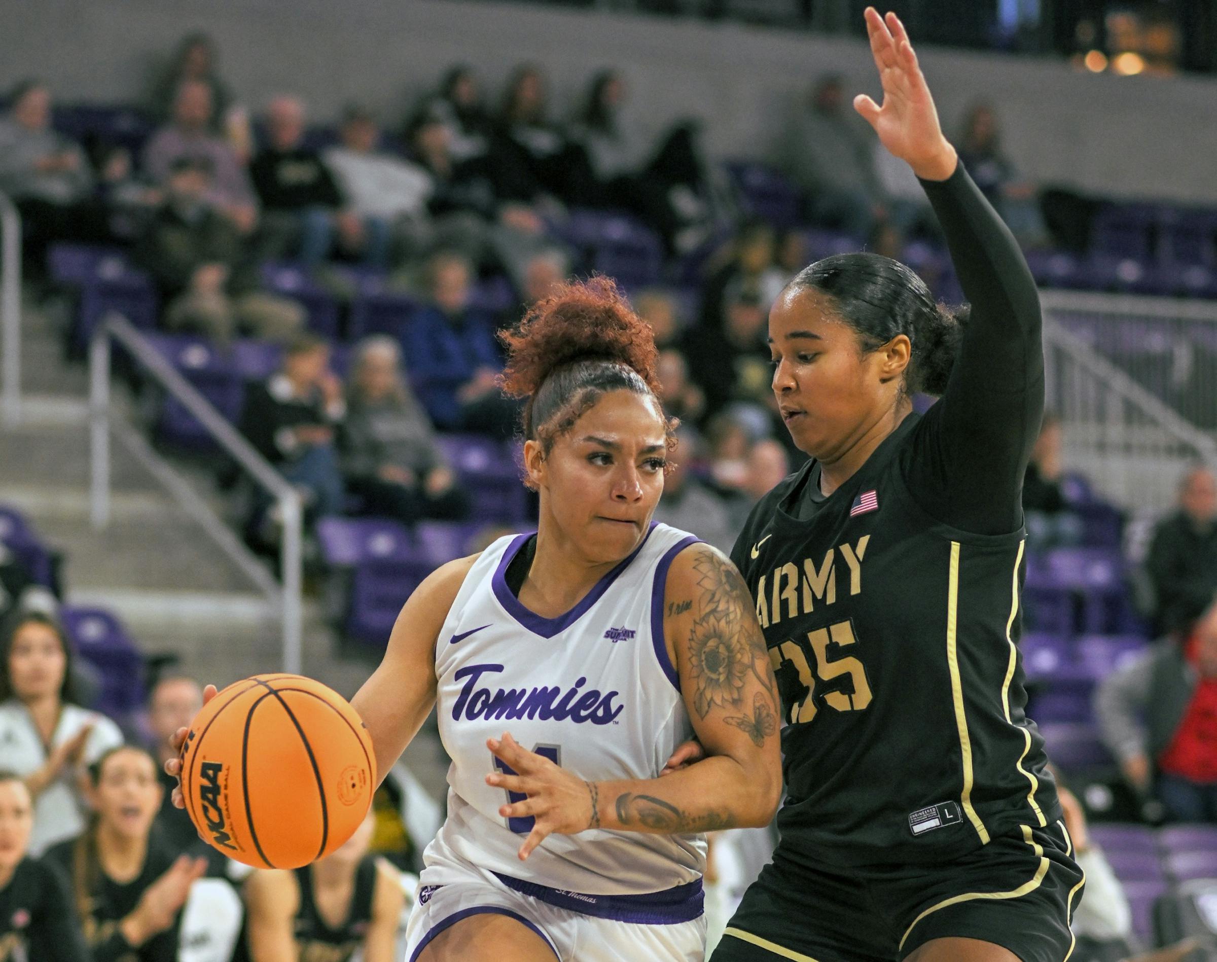La Velle E. Neal III: St. Thomas Tommies women's basketball player Jada ...