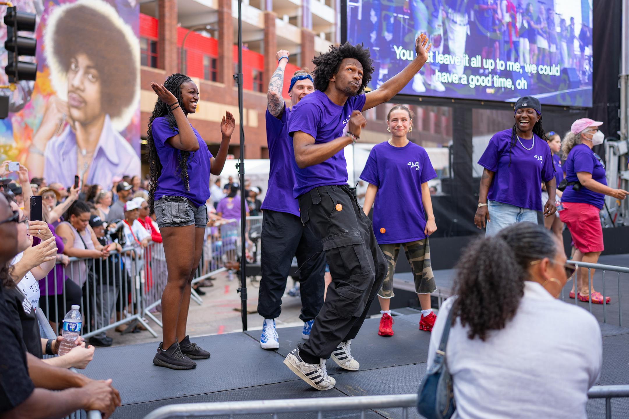 Downtown Minneapolis fills with Prince fans for a birthday sing-along