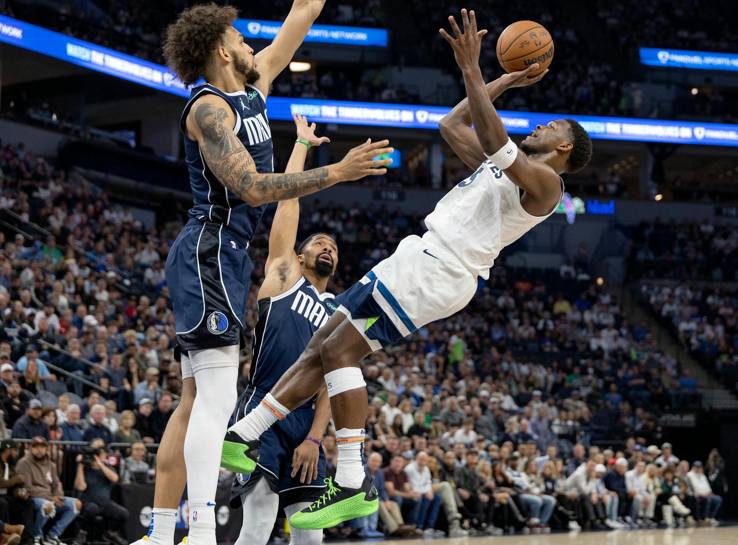 Kyrie Irving, Luca Doncic lead Mavericks past Timberwolves 120-114