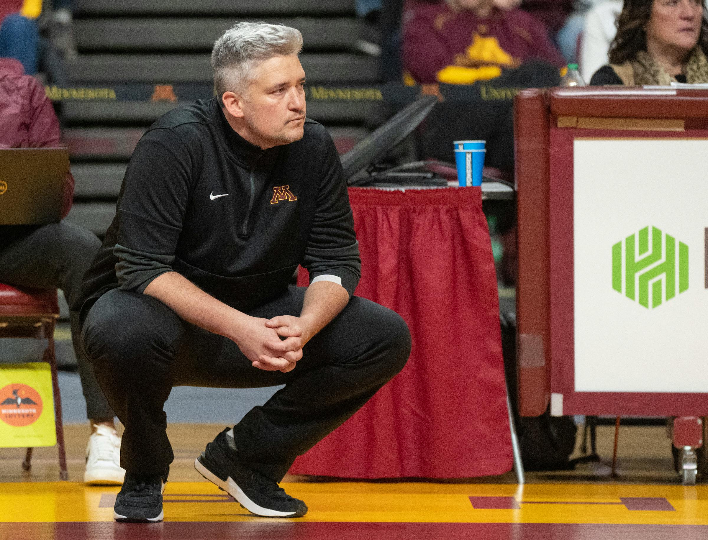 Golden Gophers volleyball coach Keegan Cook explains some of the team's ...