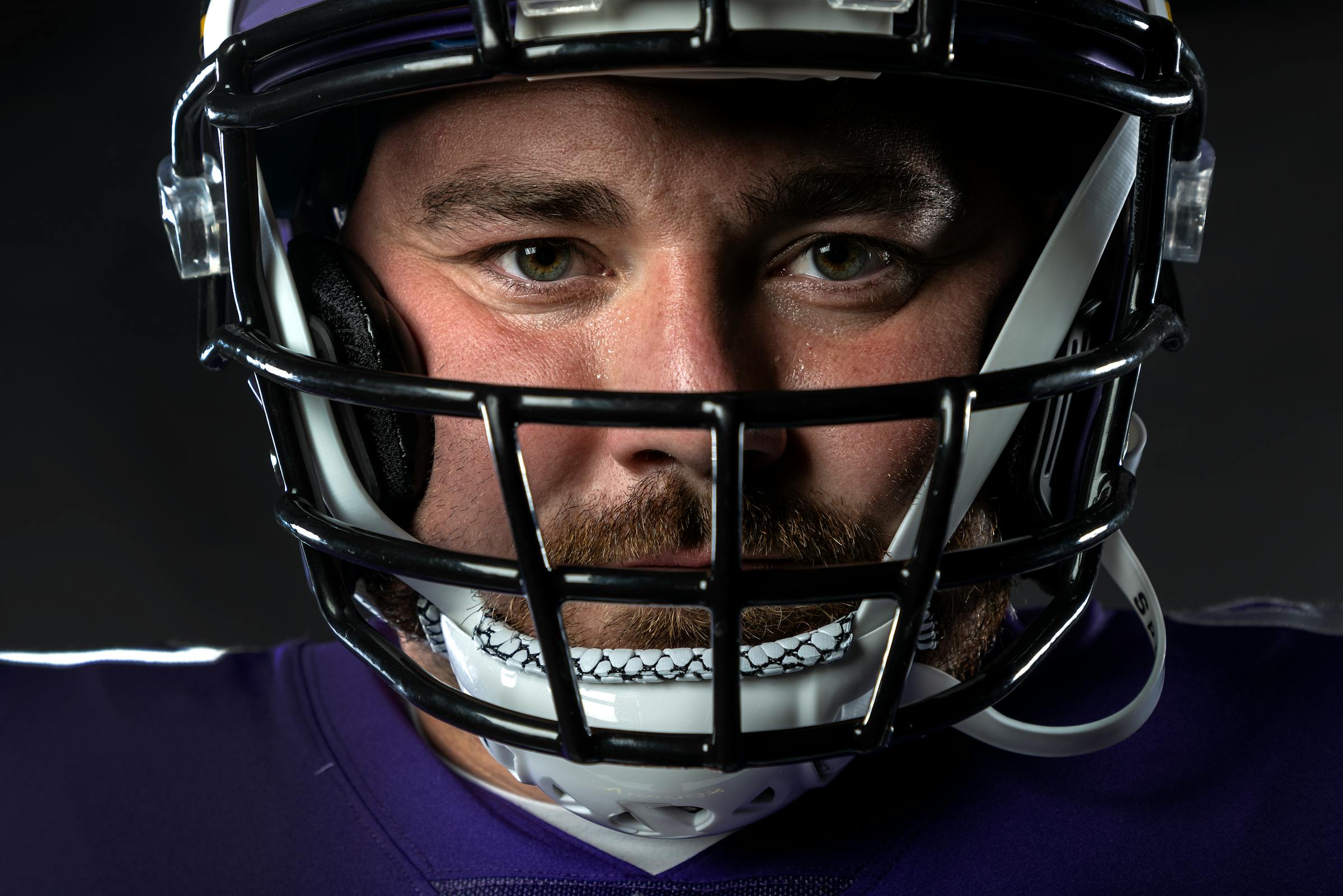 Son of 'Purple Lady' and a Vikings fan, Harrison Phillips fits in ...