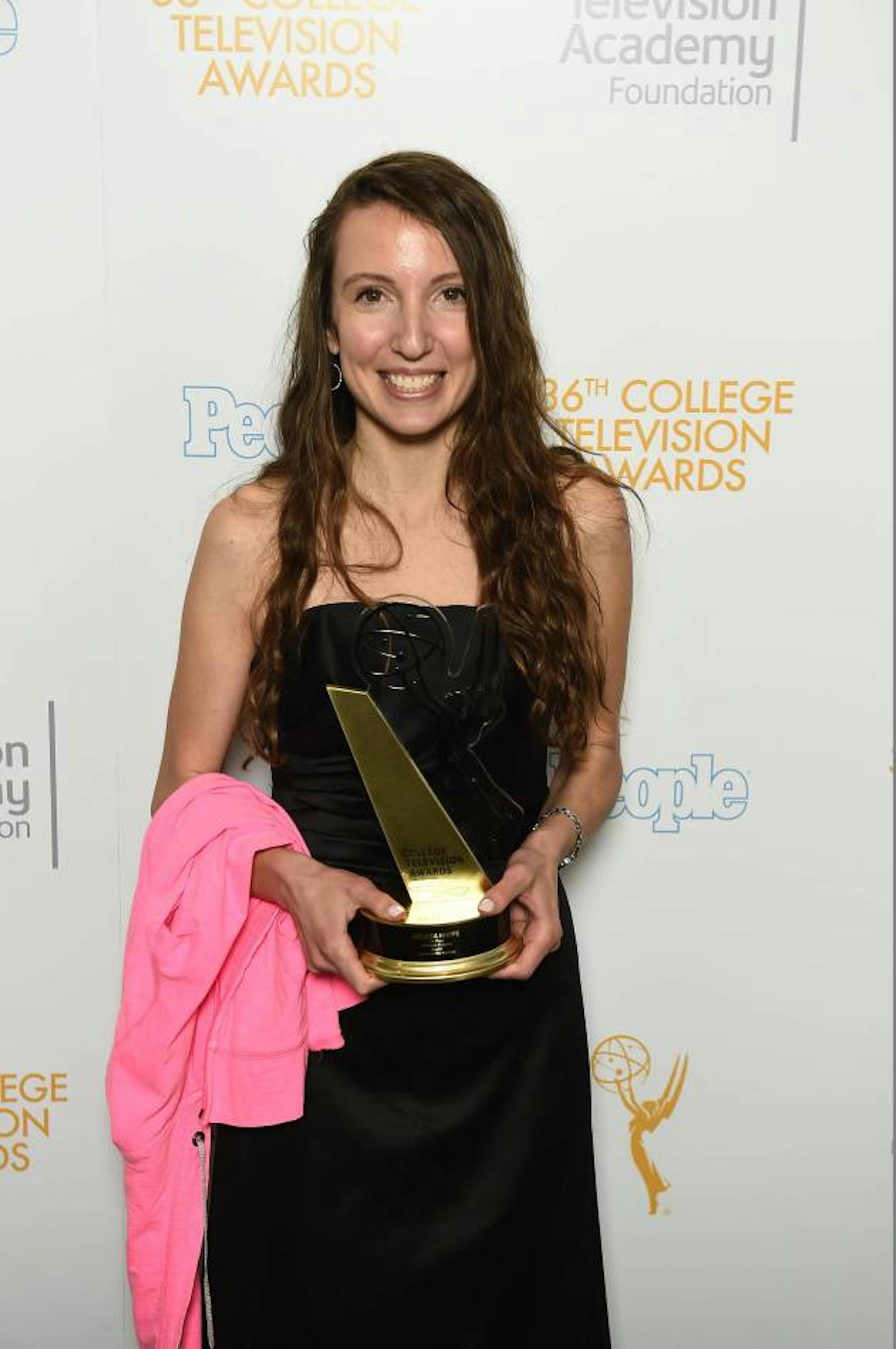 U. of St. Thomas grad Melissa Hoppe cleans up at college awards