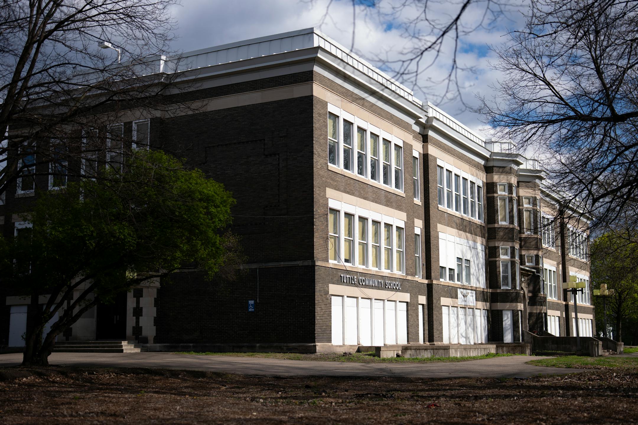 Why hasn't Minneapolis sold its six empty buildings amid deficit?