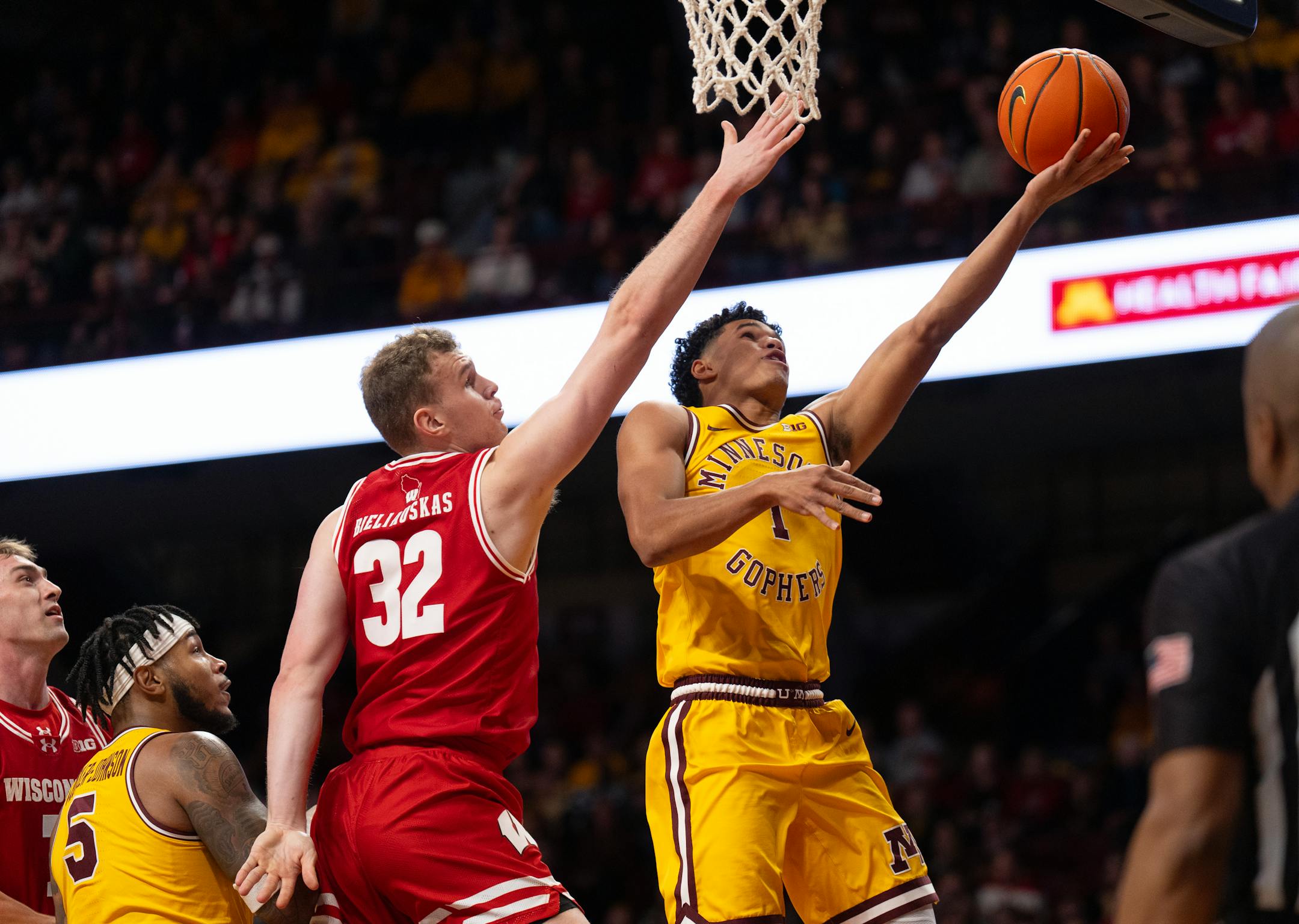 Gophers rally to tie Badgers but lose on buzzer-beater