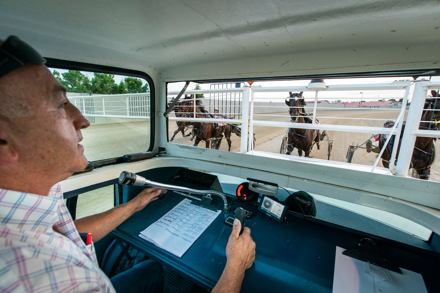 At the Running Aces racetrack, hooves pound, manes fly and the Cadillac ...