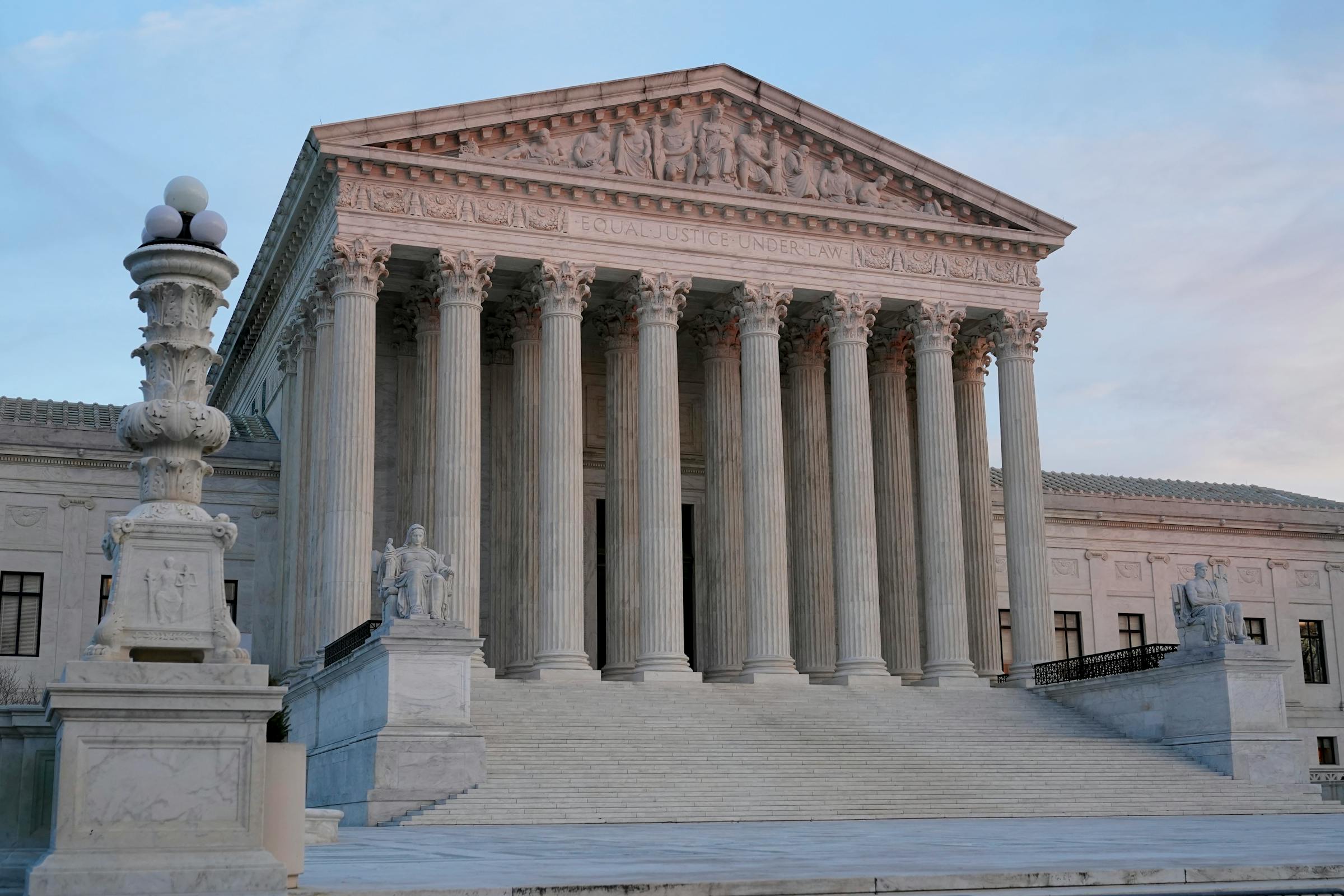We dissent to the Supreme Court's voting rights decision