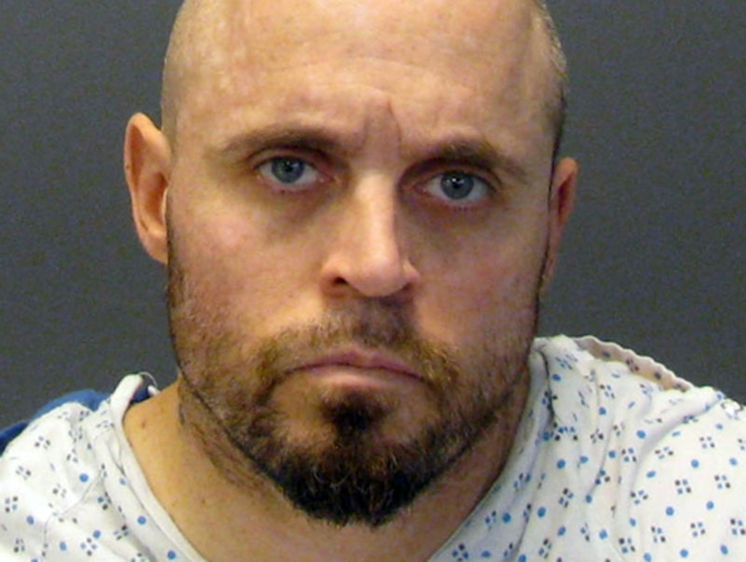 Accused Minnesota cop killer makes first court appearance