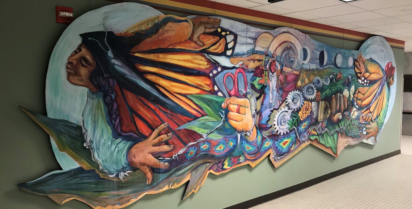Stories of immigrants and refugees captured in a mural at Mpls. City Hall