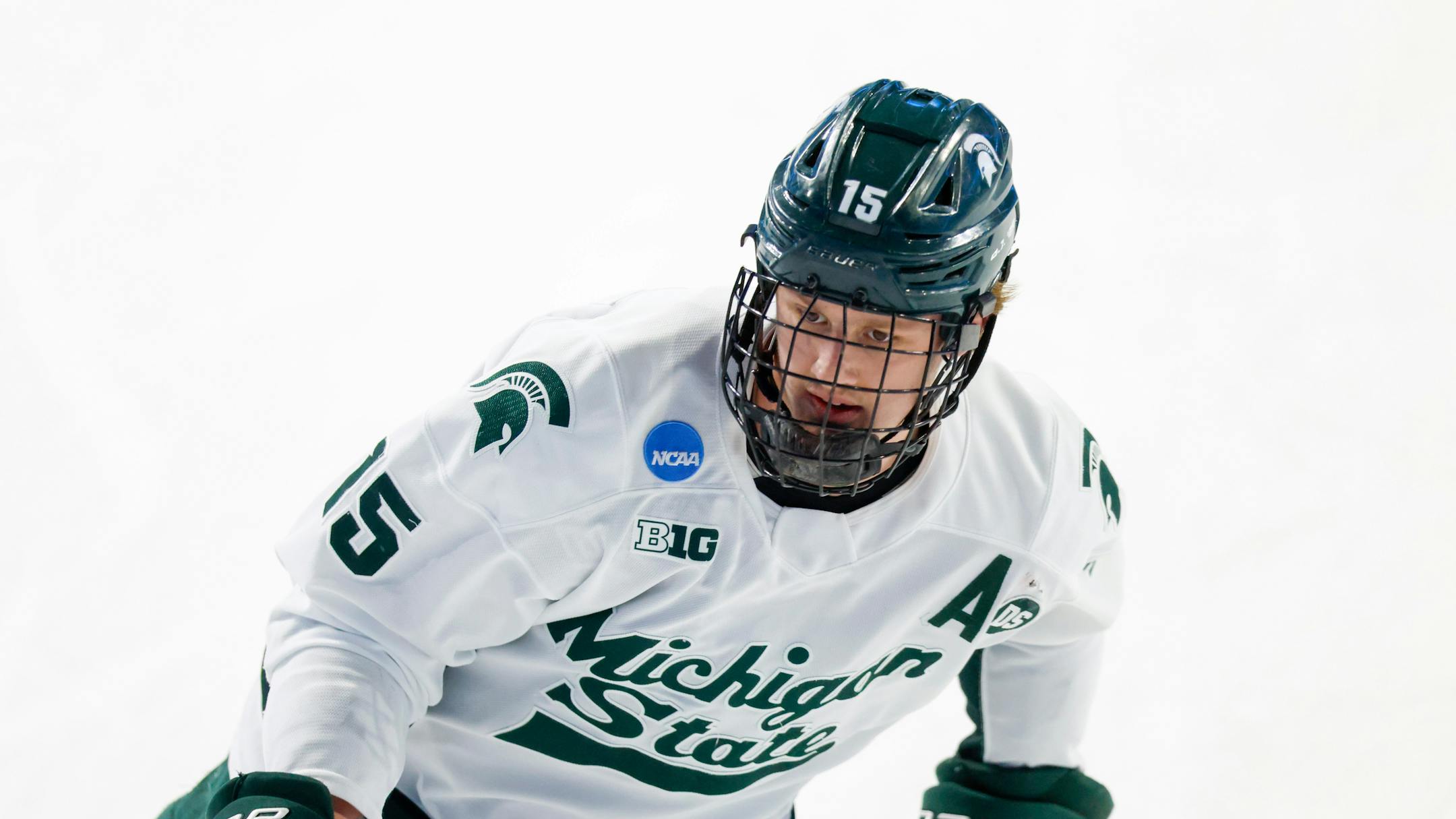 North Dakota, Wisconsin earn Frozen Four berths; Wild prospect Charlie ...