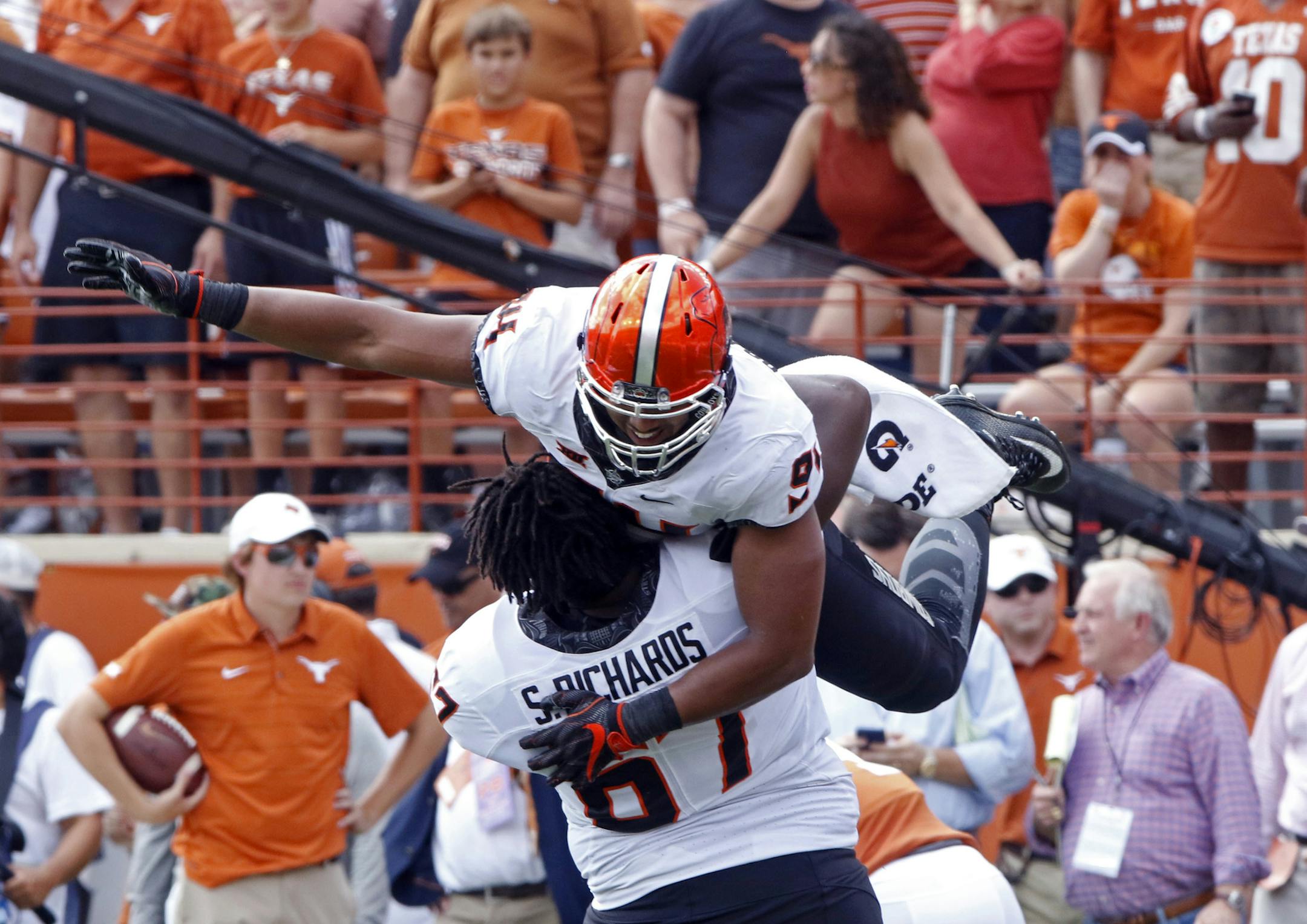 End-zone interception preserves No. 10 Oklahoma State's OT victory at Texas