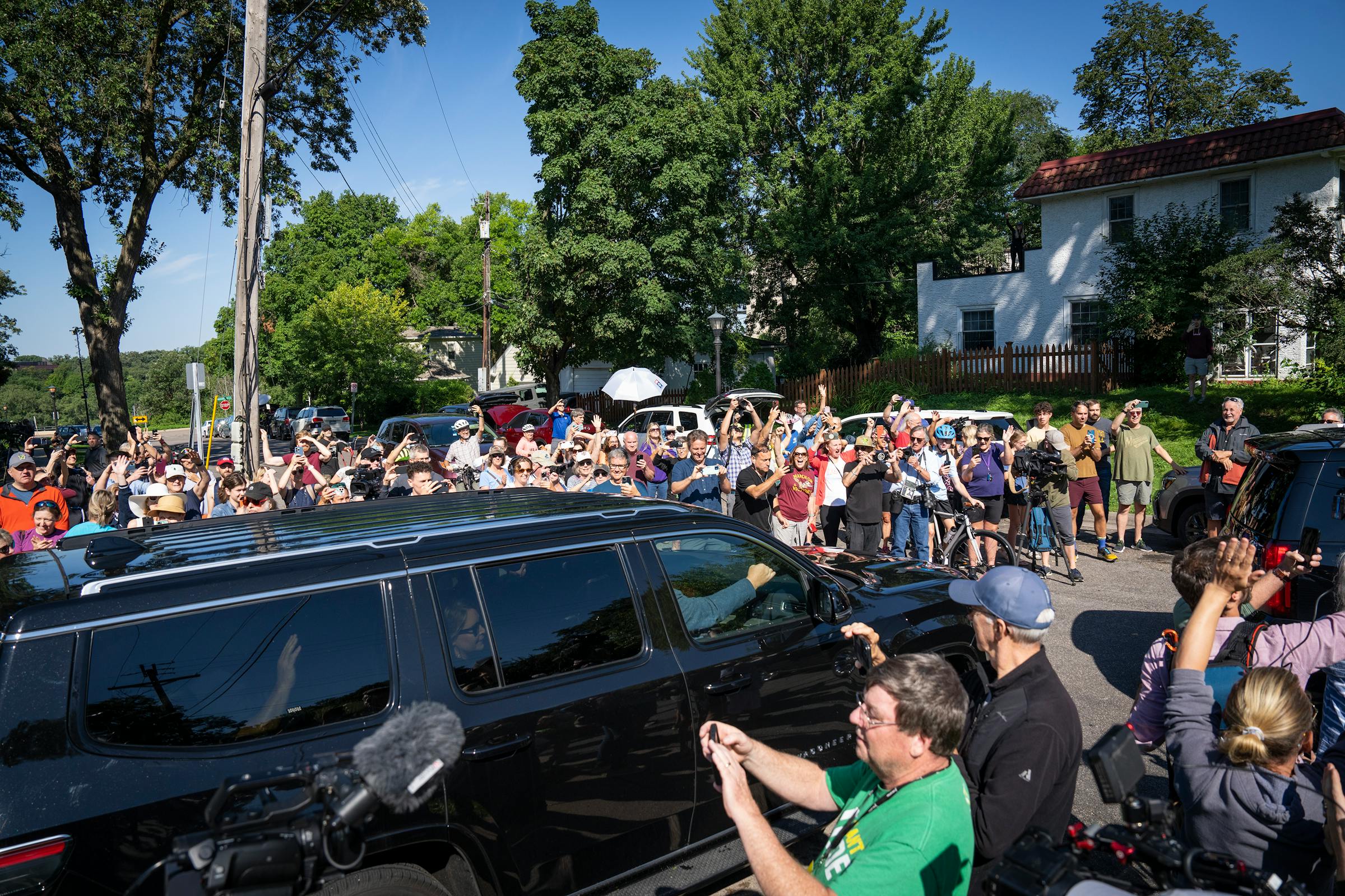 Tim Walz's neighbors gather outside residence as VP word spreads