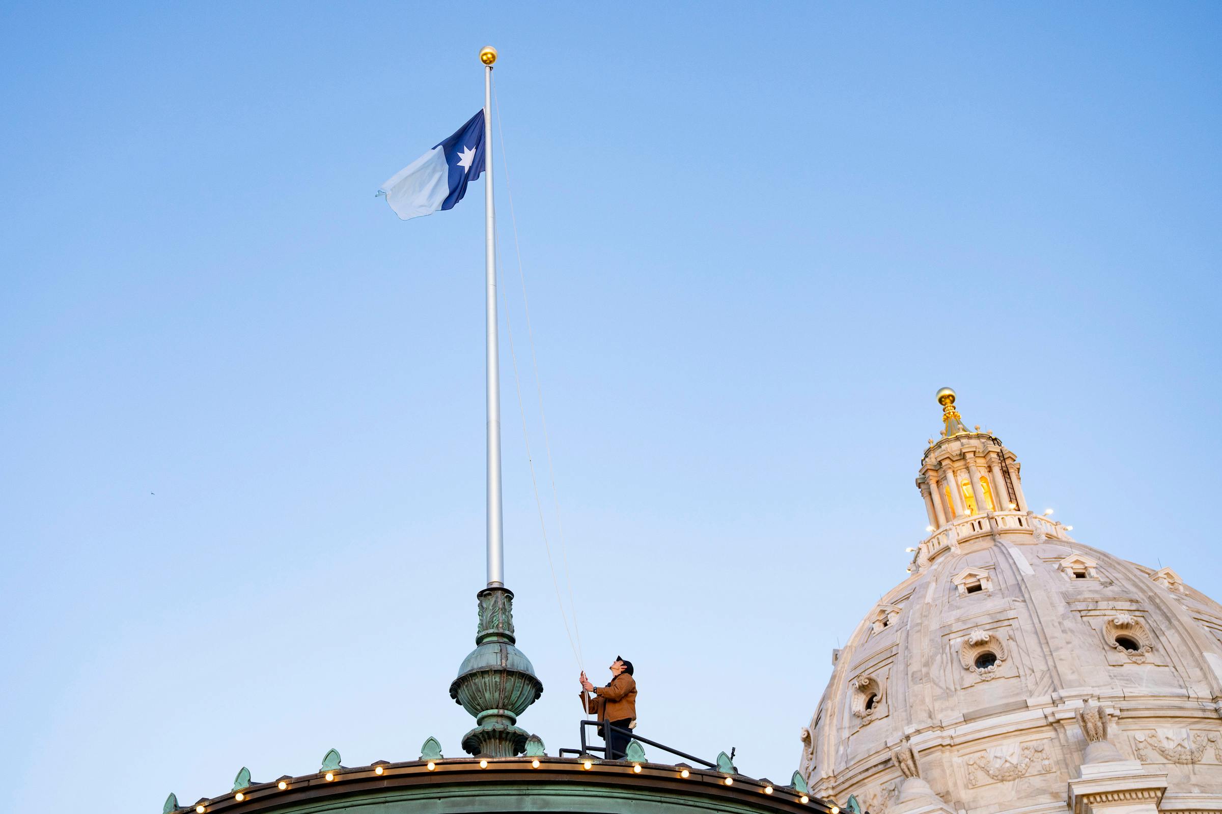 ‘Watching history happen’: Minnesota’s redesigned flag raised at State ...