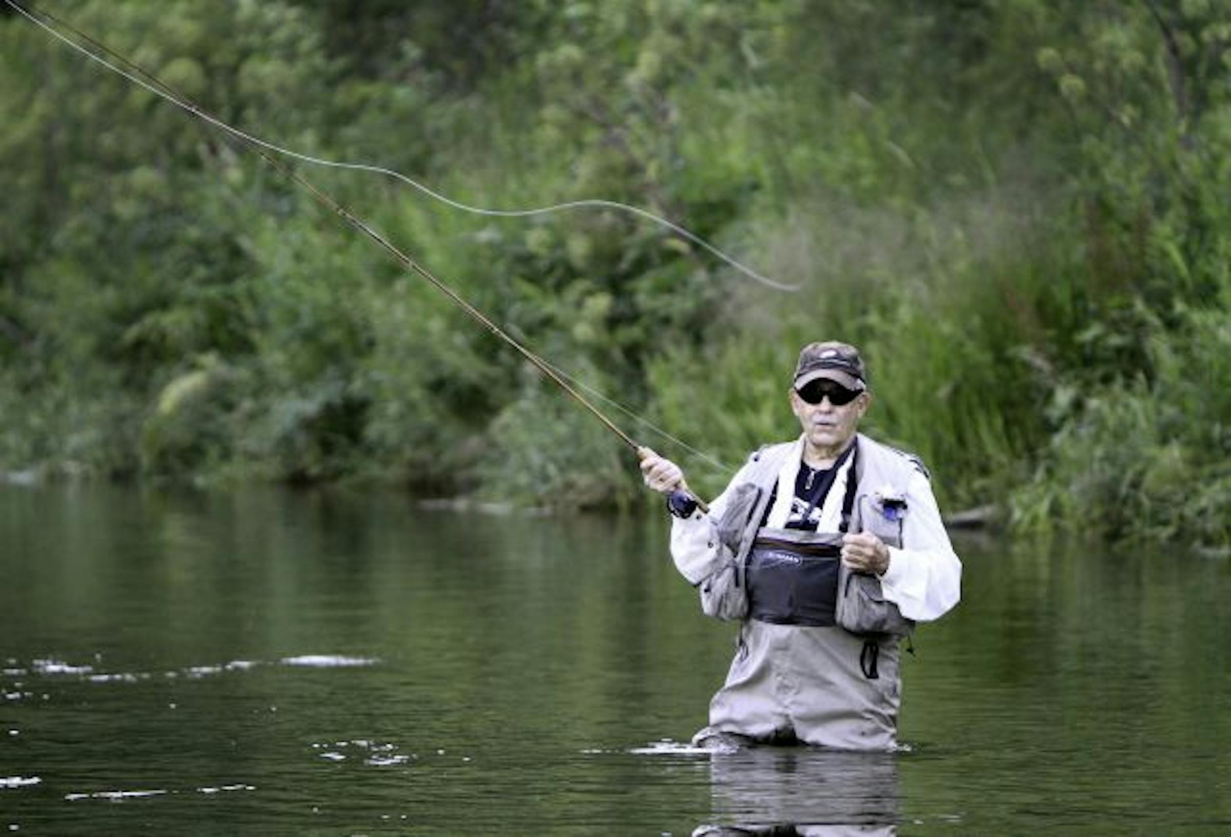 Tom Helgeson, fly-fishing editor, dies