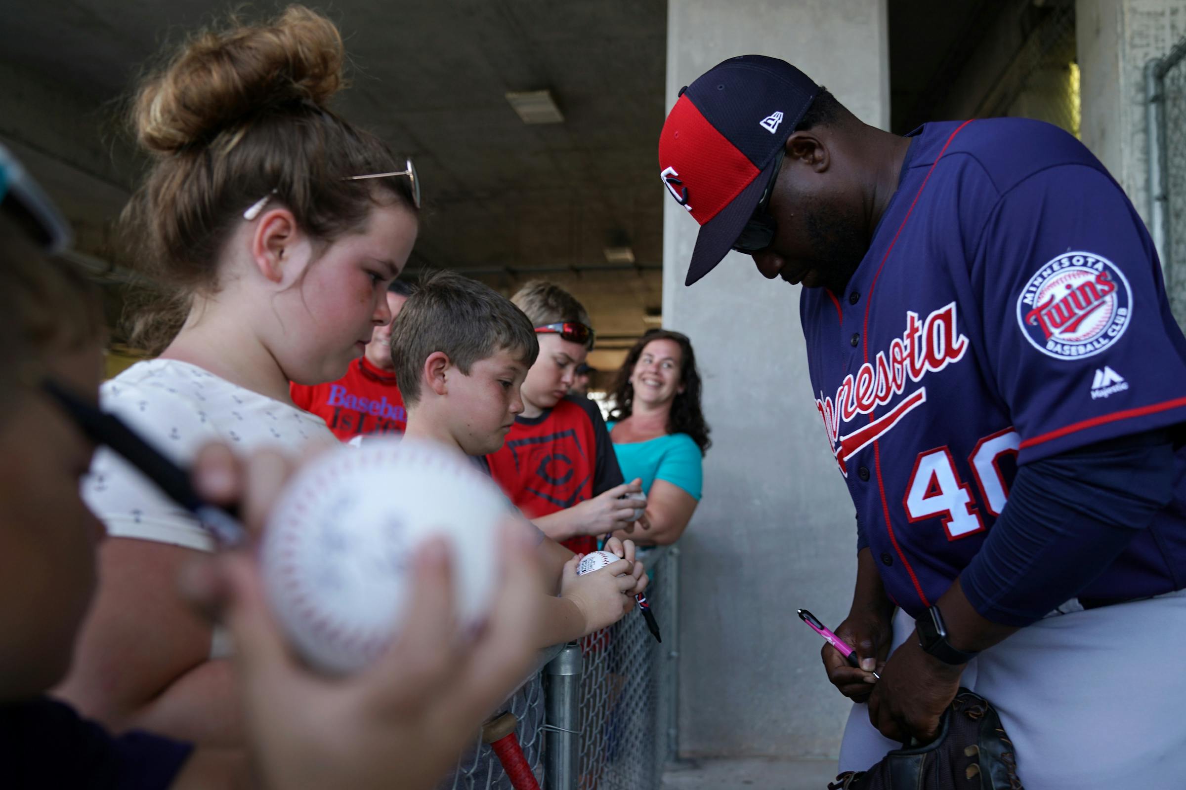 Twins first base coach Tommy Watkins turned minor league experience ...