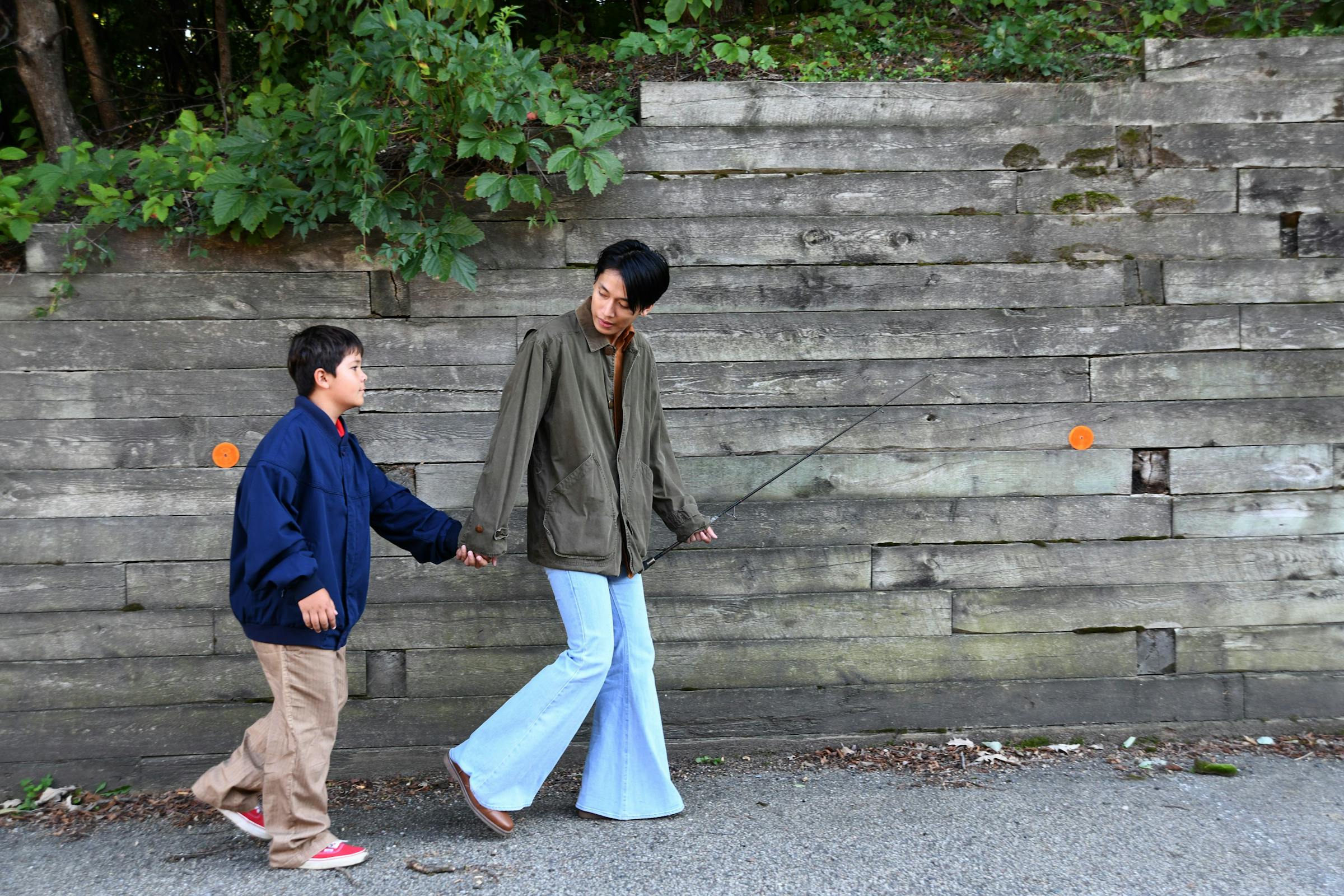 Father and son bond over fishing in poet Bao Phi's 'A Different Pond'