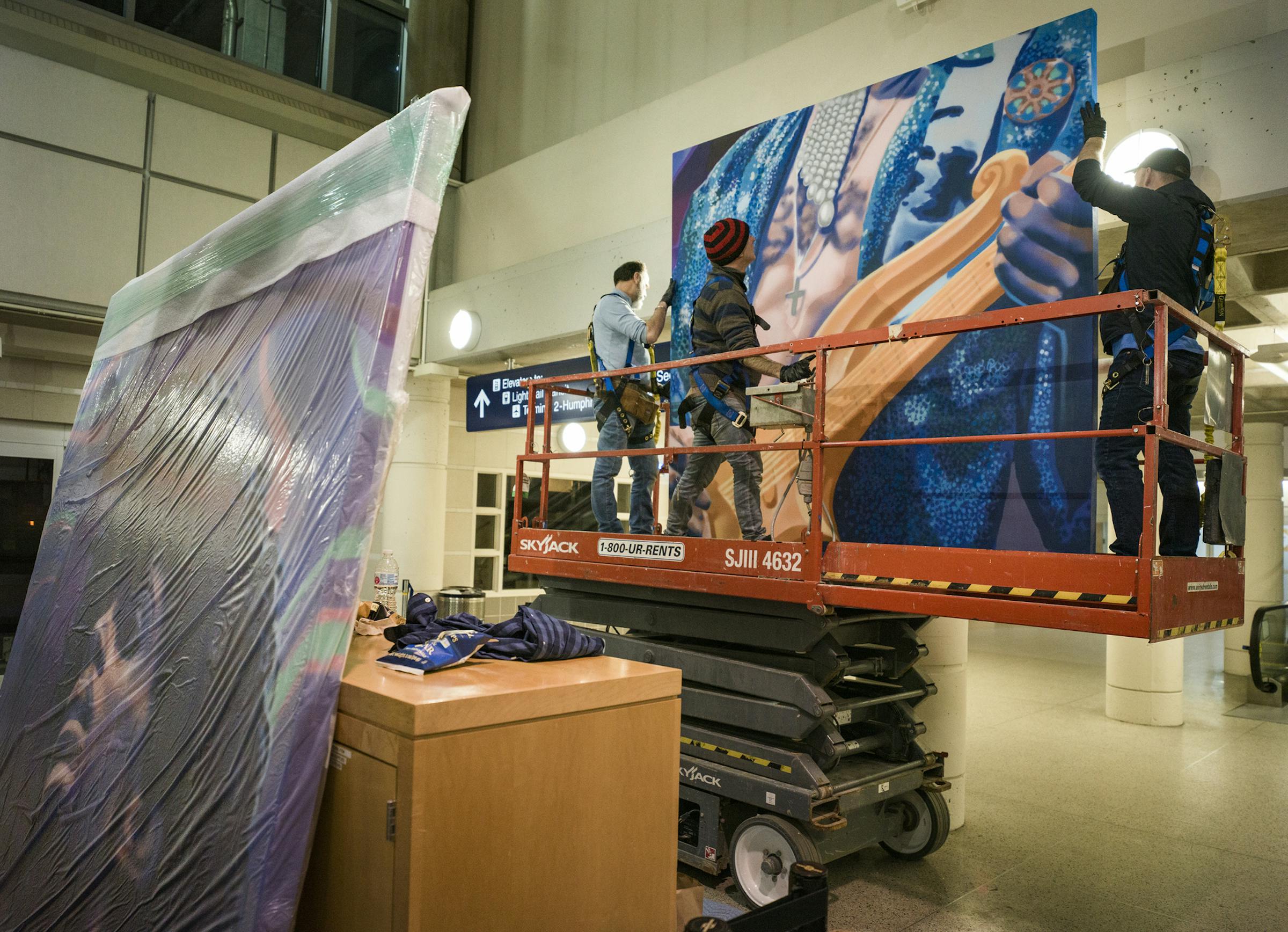 Local artist pays tribute to Prince with giant mural at MSP airport