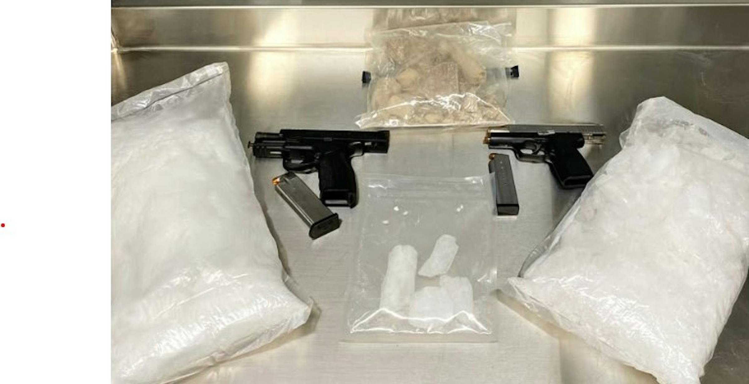 St. Paul police employee fired after guns, illicit drugs allegedly ...