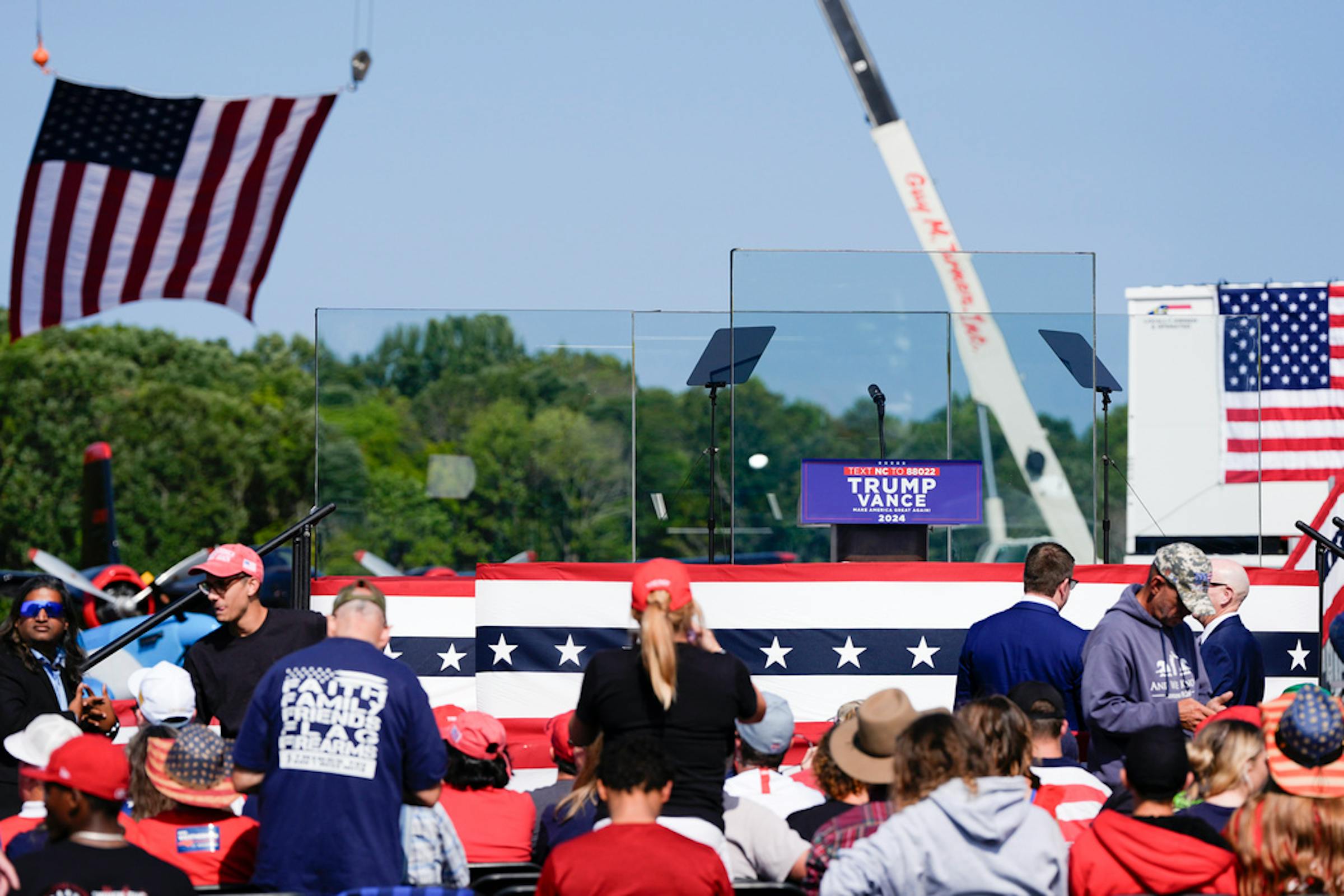 Trump speaks from behind bulletproof glass at first outdoor rally since ...