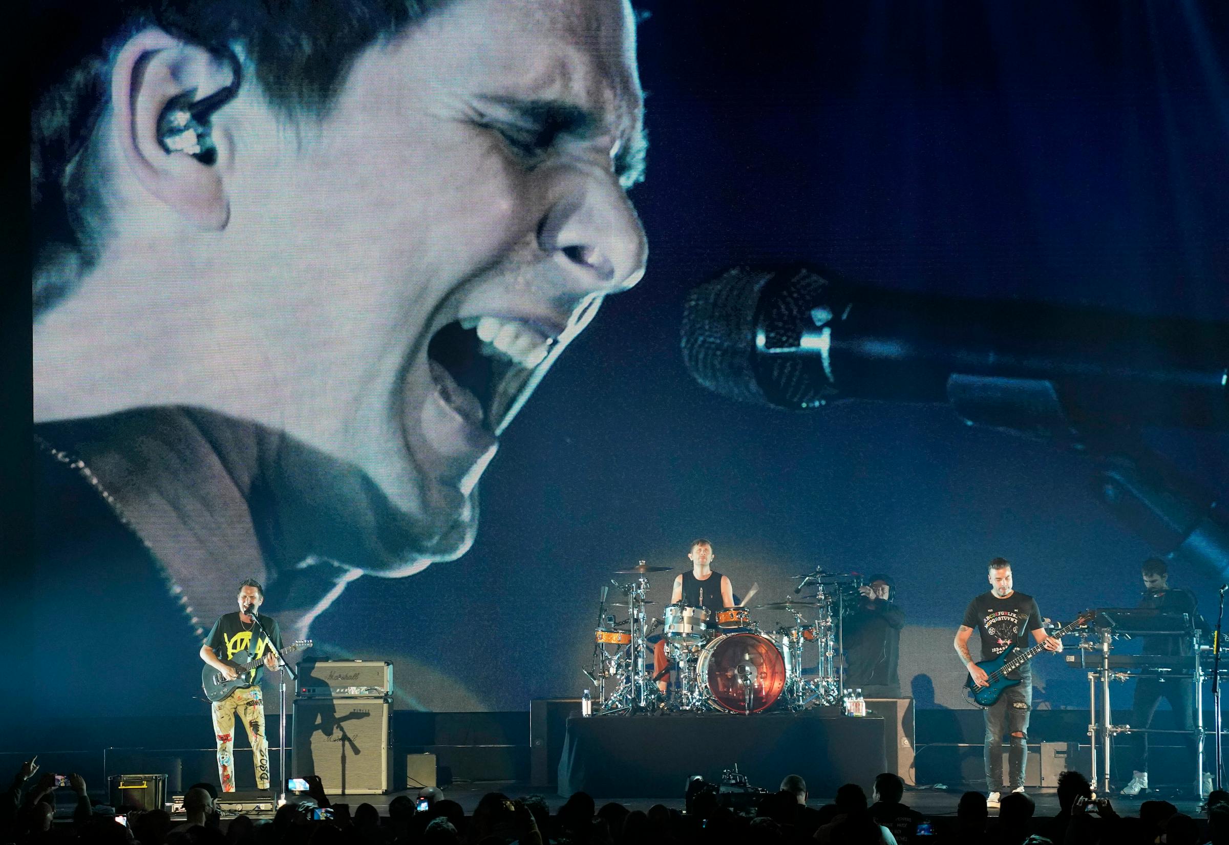 Review: Muse and Evanescence make a dramatic pair in Minneapolis rock ...