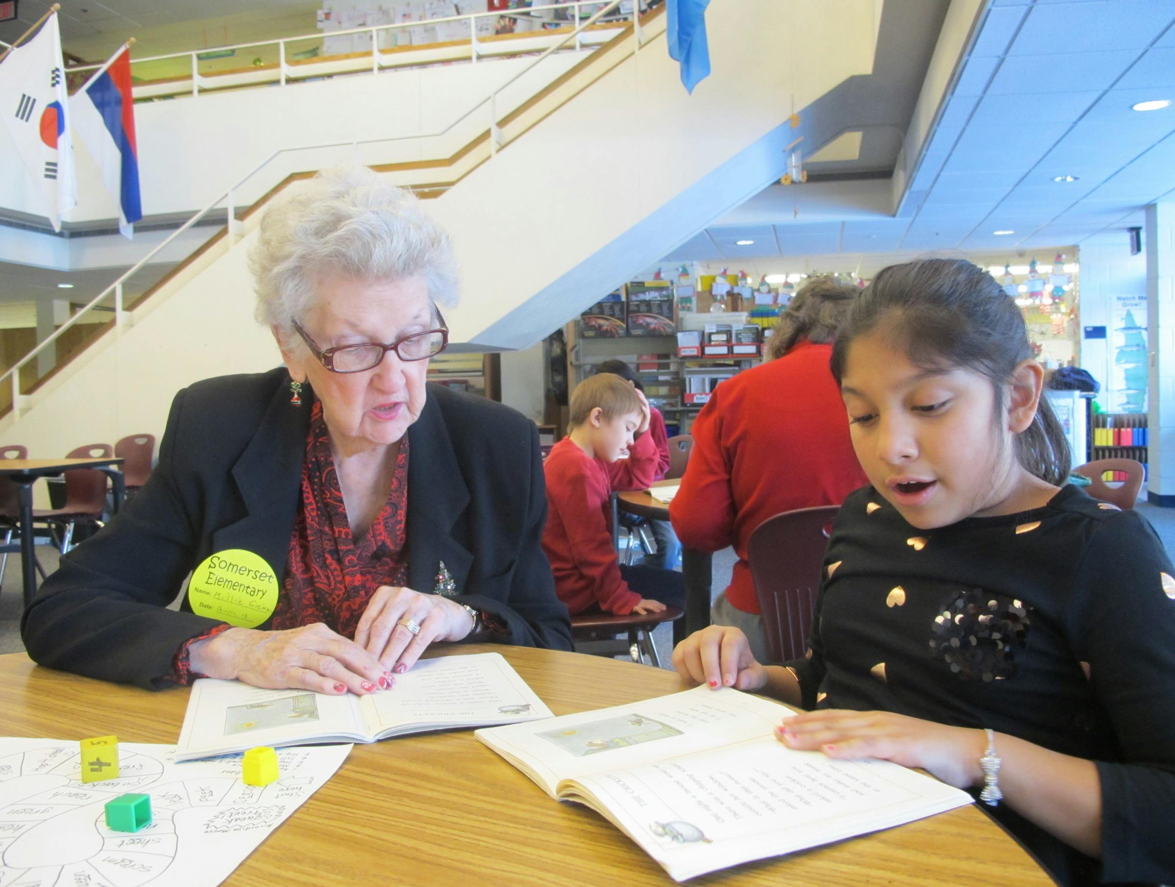 Pupils pair with adults for a two-way-learning experience