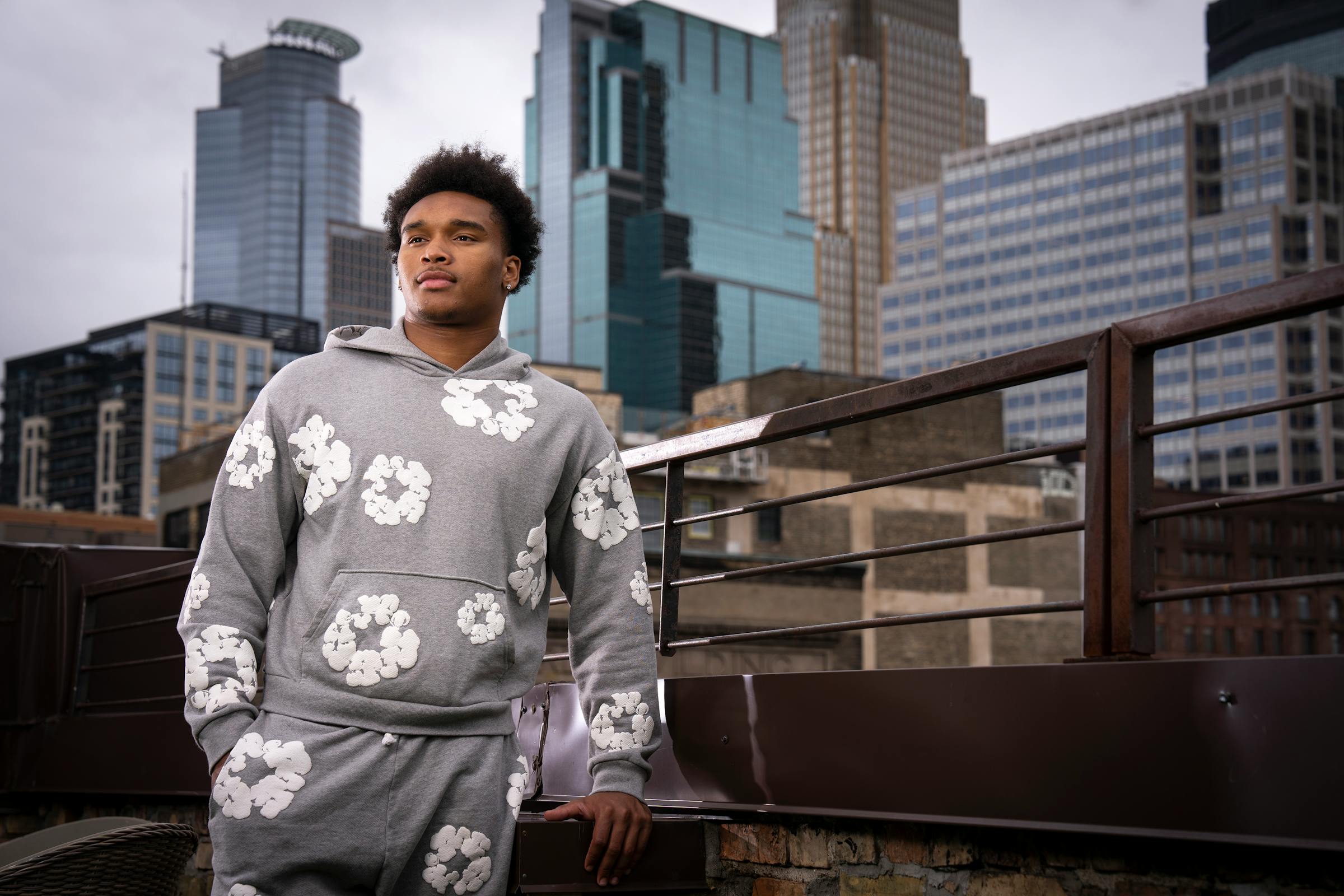 Minnesota Gophers running back Darius Taylor Jr. pushes onward with a ...