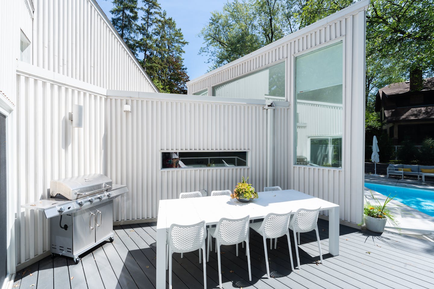 'Fun' triangular pool transforms backyard of star-shaped Minneapolis house