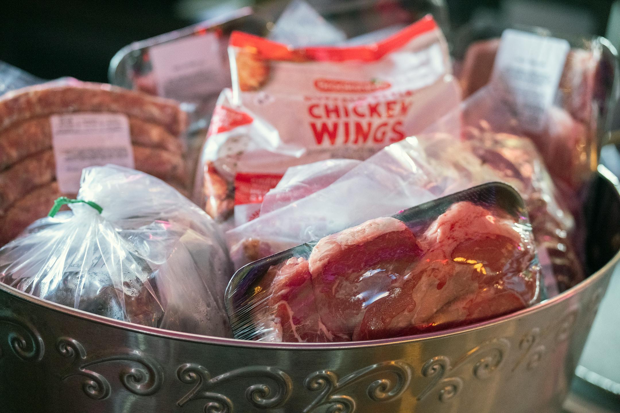 What's the history of the meat raffle in MN?