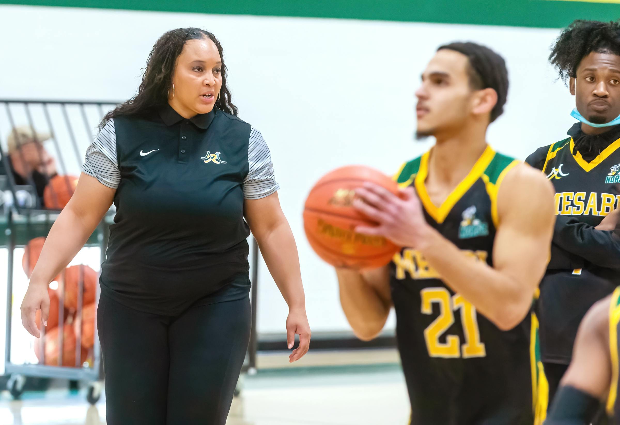 Tamara Moore taking steps in historic first season coaching men's hoops ...