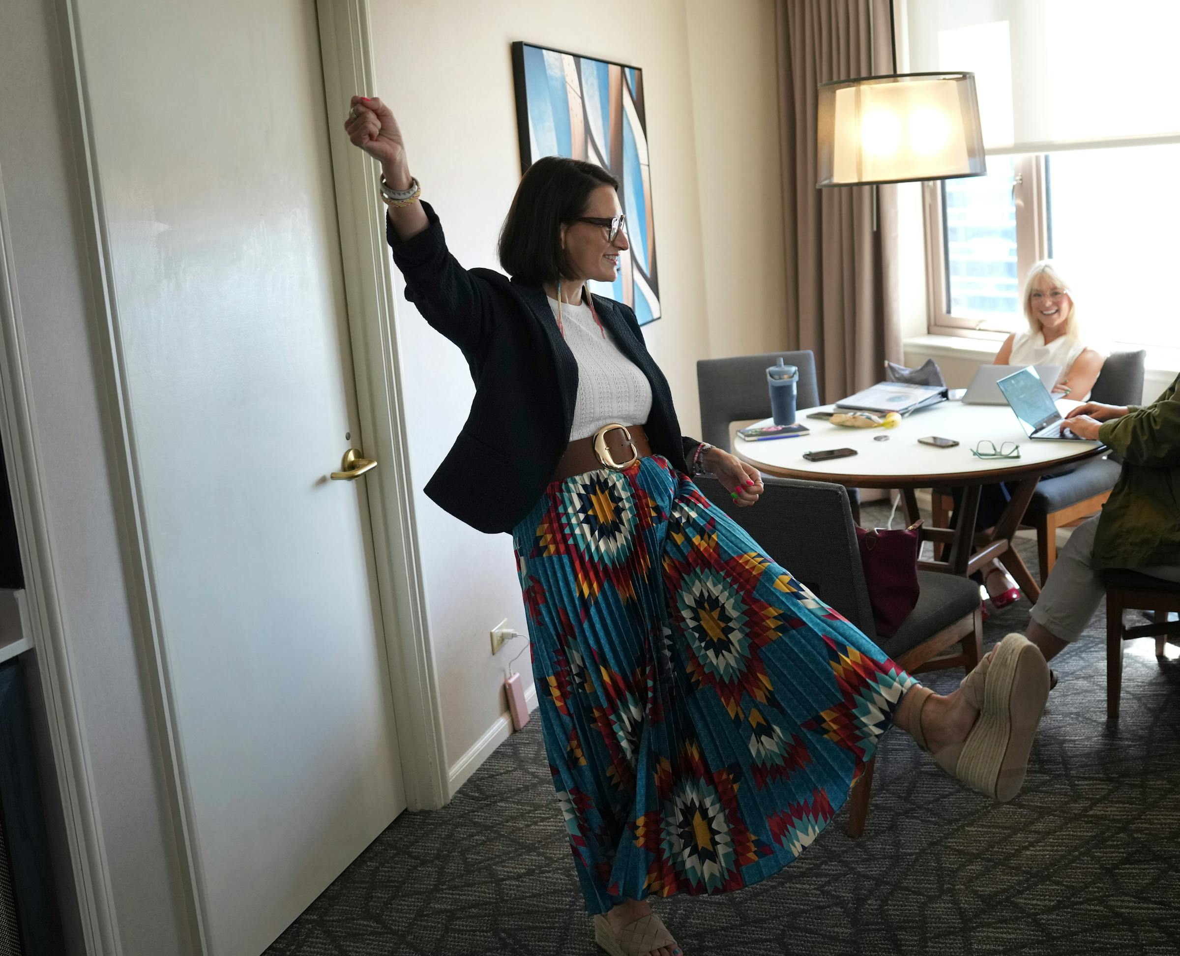 Minnesota Lt. Gov. Flanagan watches as her friend ascends the national ...