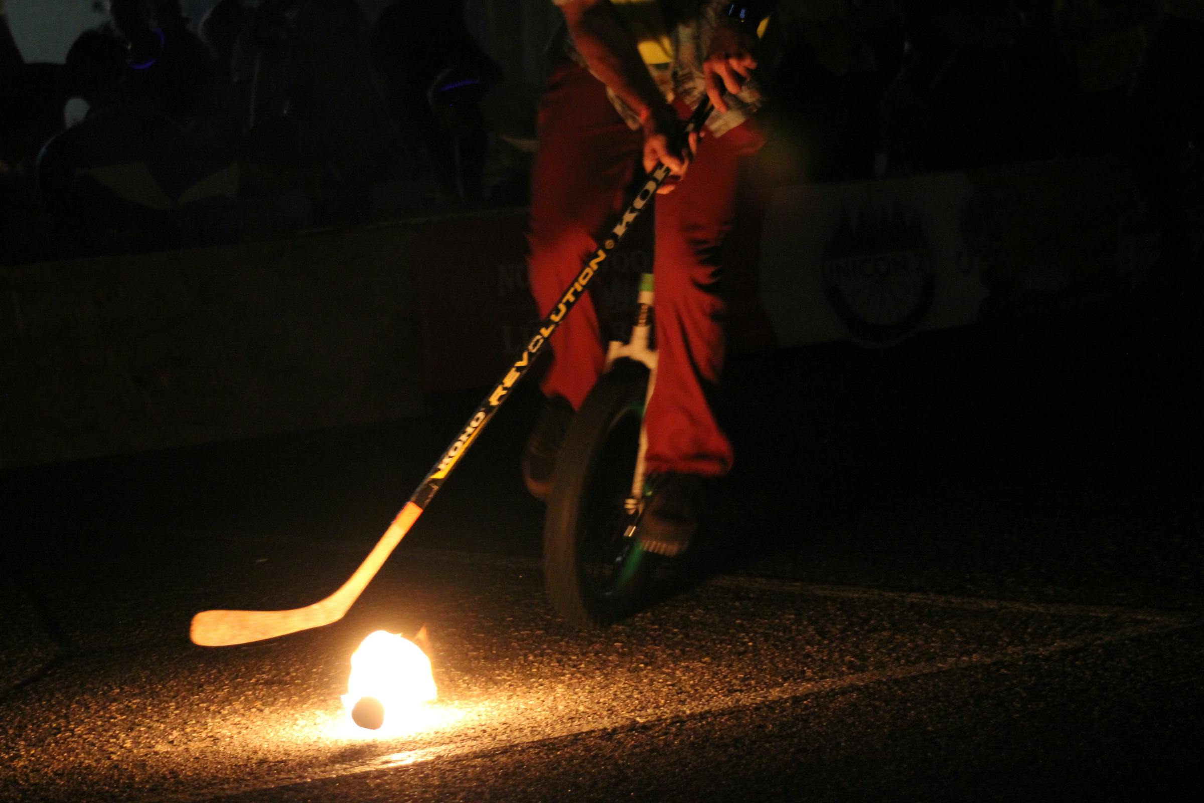 Watch unicyclists play flaming puck hockey at Unicon in Bemidji