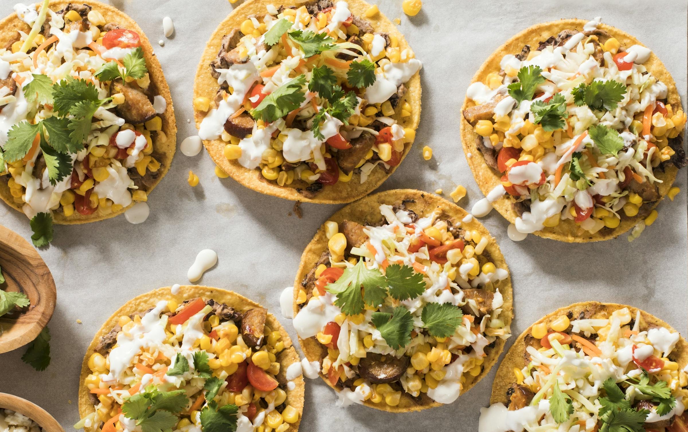 Chorizo, Corn and Tomato Tostadas With Lime Crema