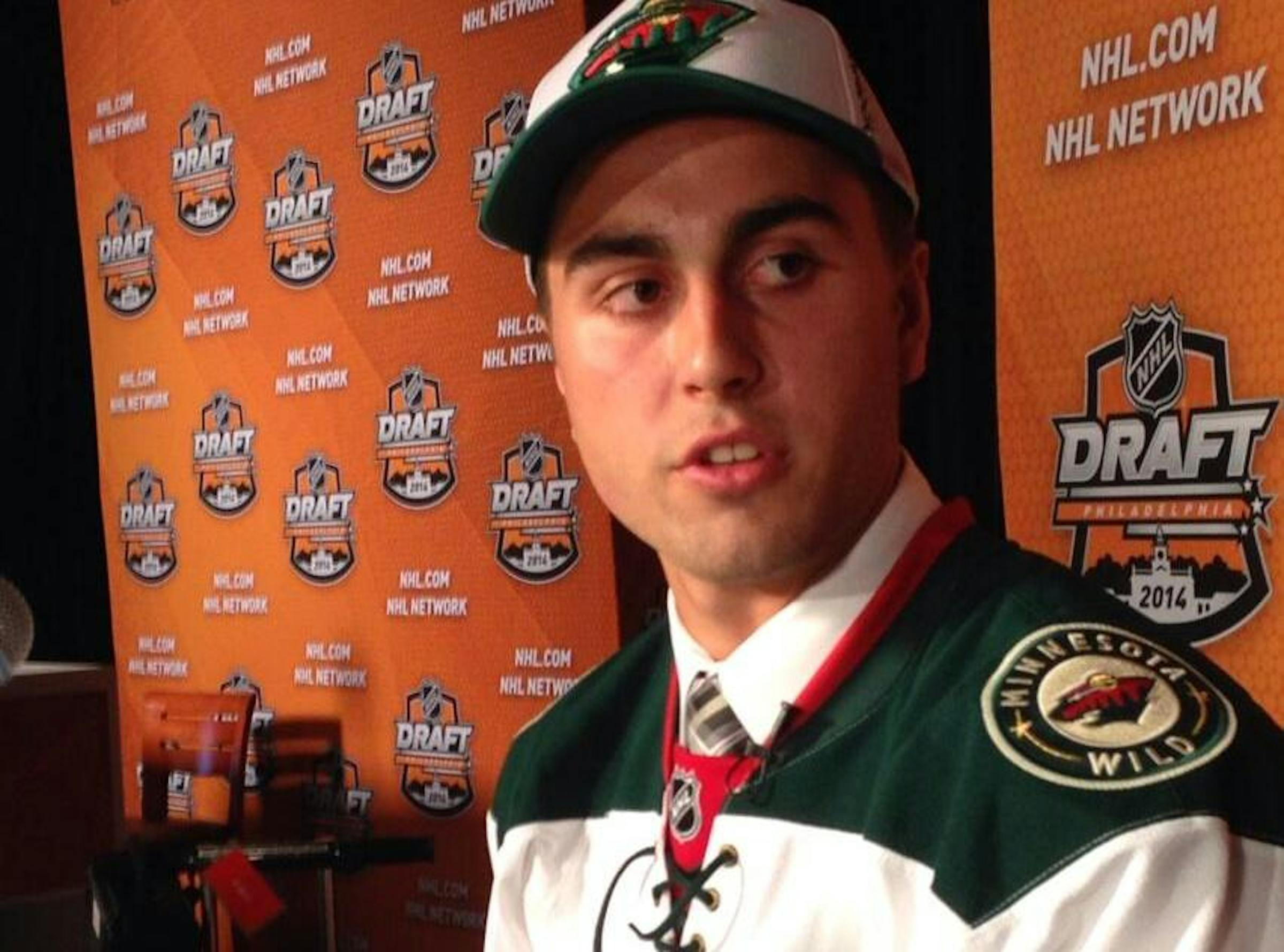 Wild takes Alex Tuch at No. 18