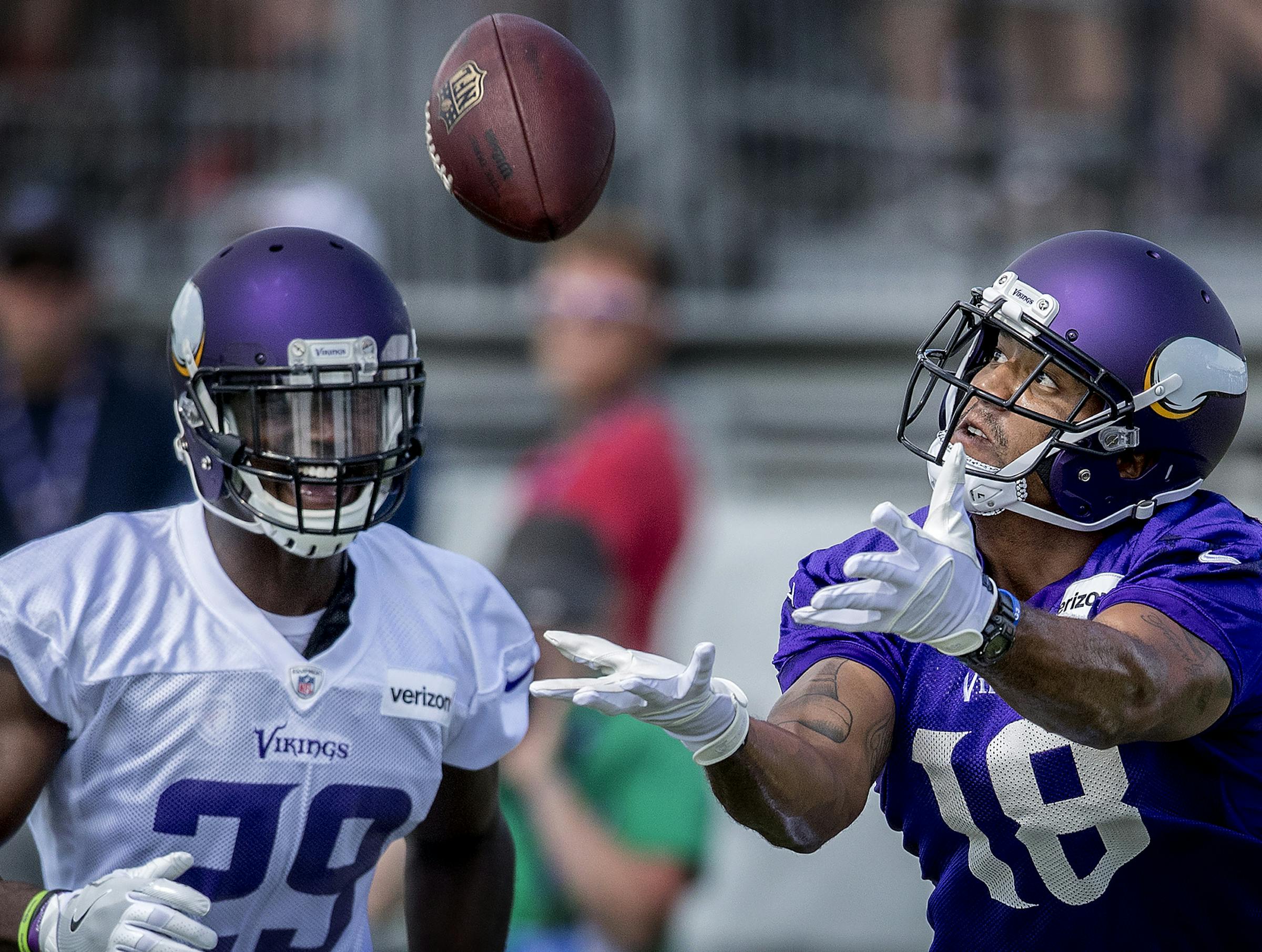 Vikings wide receiver Michael Floyd leans on support from outside of ...