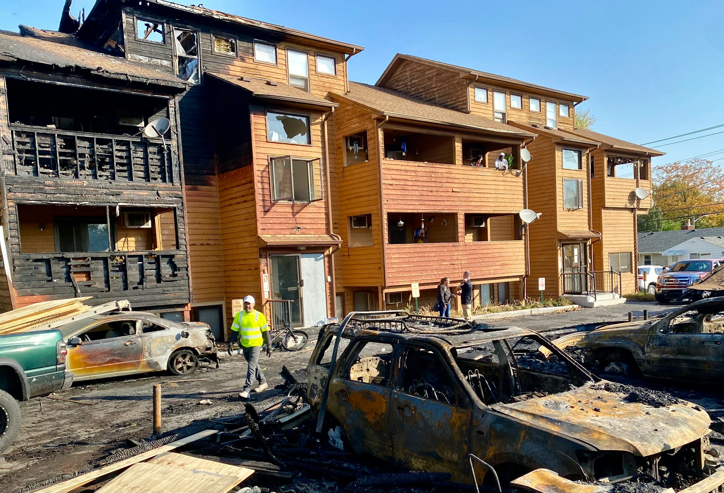 Dozens displaced after large fire ravages 2 residential buildings ...