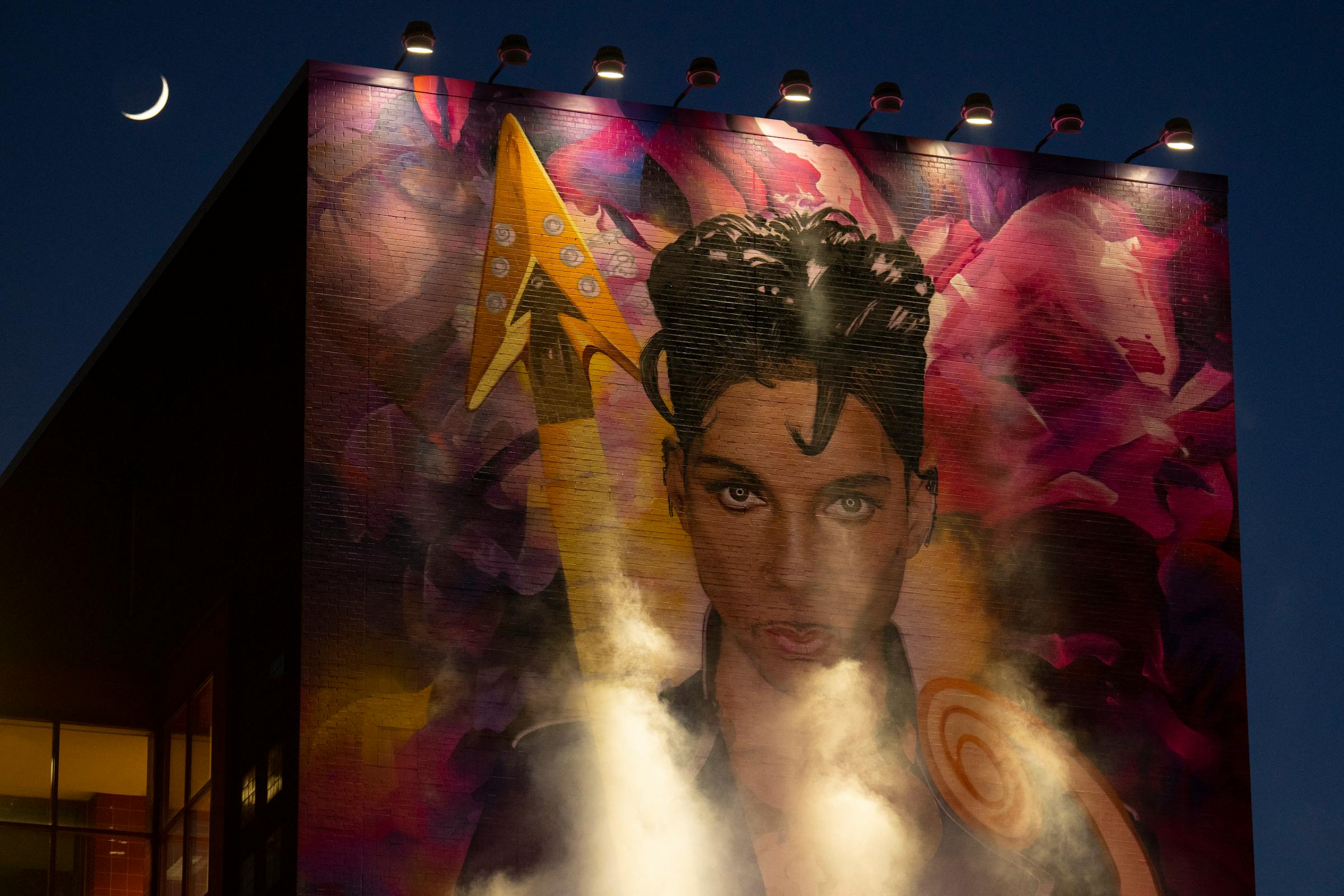 Dig if you will this Prince mural as downtown Minneapolis goes purple