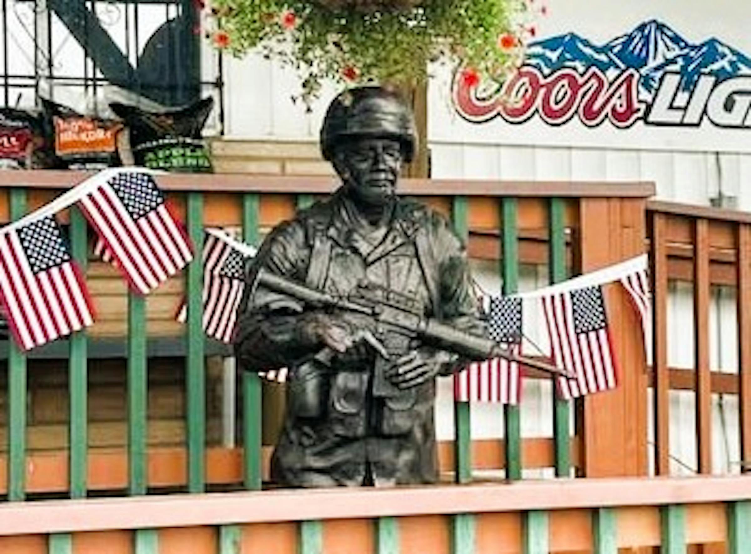 Three young man toyed with a statue of a soldier, then drove away with ...